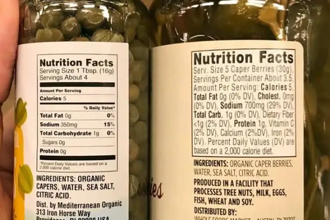 labels showing nutrition facts for capers and caper berries - Superfoodly